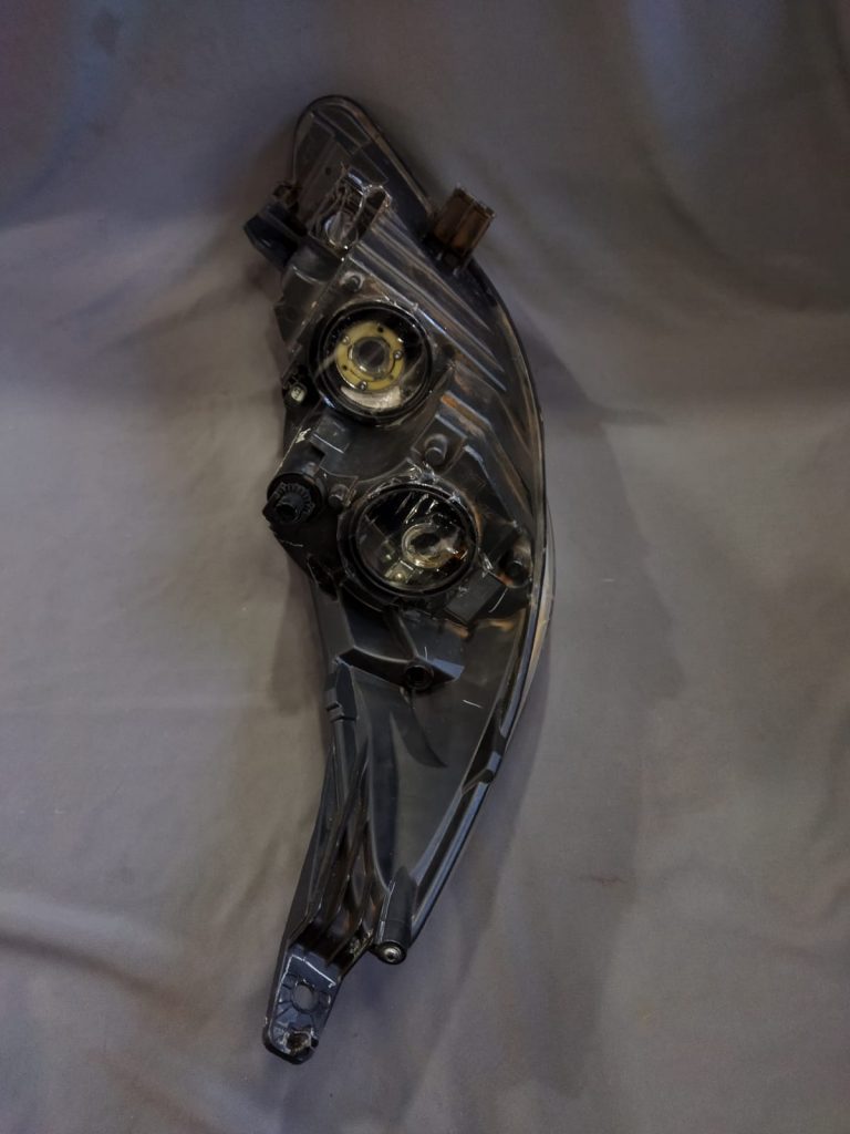 FAROL NEW FIESTA MEXICANO 11/12 CROM PISCA AMBAR LE - Auto Peças Picolotto